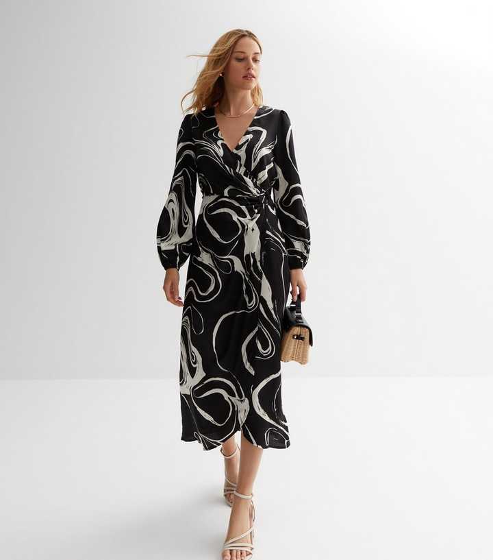Wikkel midi-jurk met ringdetail en wervelende print