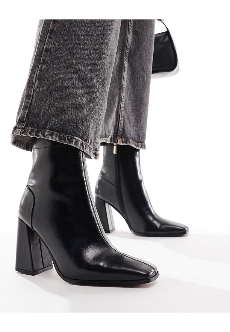 ASOS DESIGN Everest flared heel boots in black