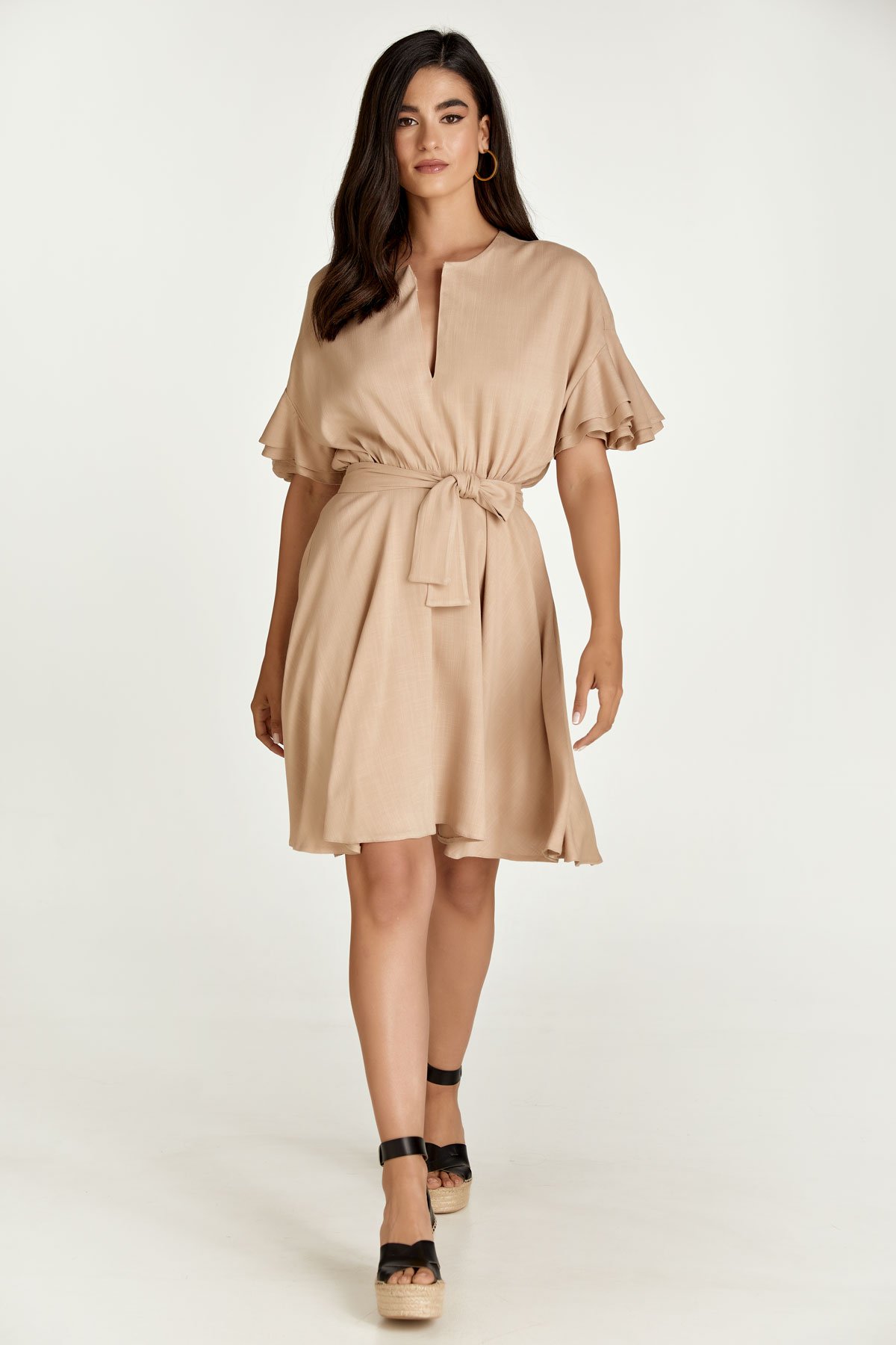 Beige jurk met ruches