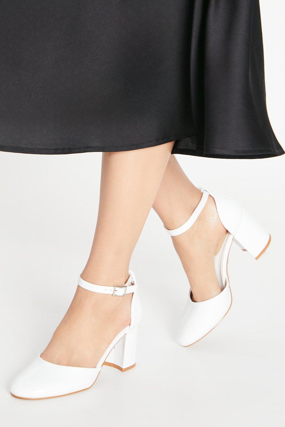 Emelda Round Toe Block Heel Court Shoes