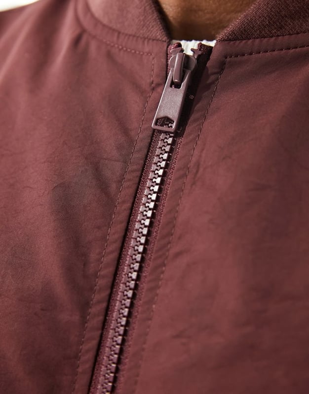 ASOS DESIGN lightweight bomber jacket in burgundy-Red
