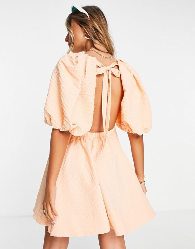 ASOS DESIGN open back puff sleeve mini dress in apricot texture-Orange