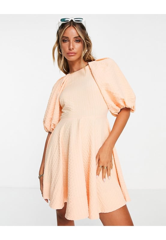 ASOS DESIGN open back puff sleeve mini dress in apricot texture-Orange