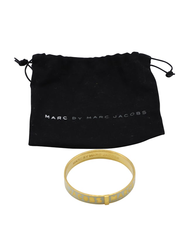 Marc by Marc Jacobs Logo Bangle in Gold Metal