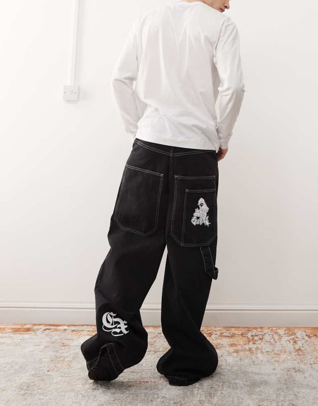 COLLUSION X002 baggy jeans with skater print in washed black - MULTI